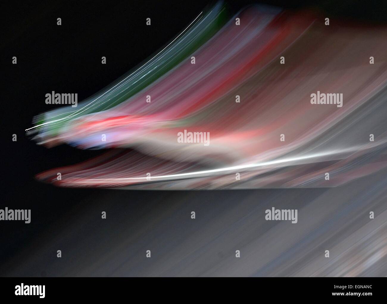 Taku Takeuchi of Japan soars through the air during the men's team ...