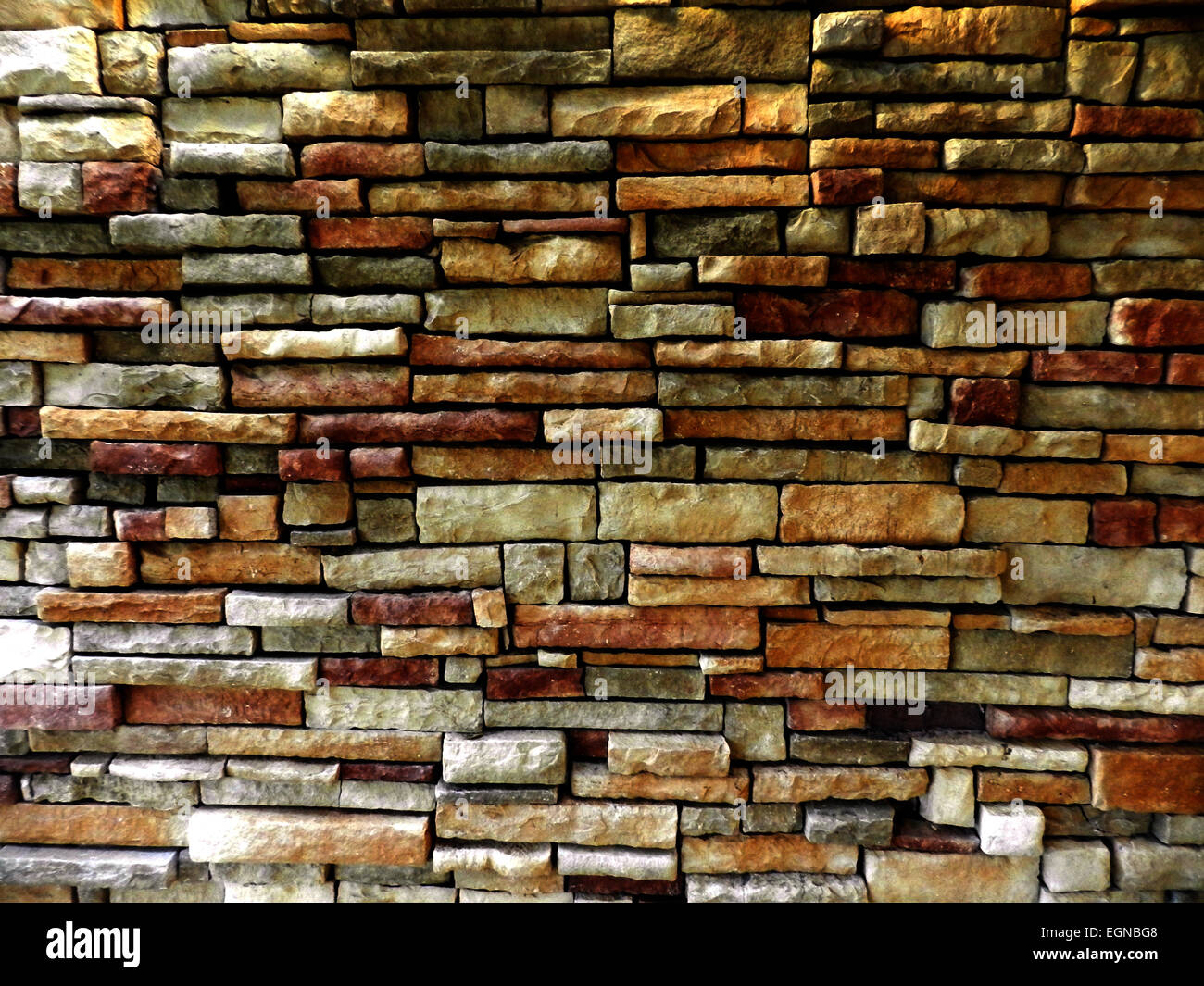 Colorful outdoor brick wall texture background outdoor in the park ...