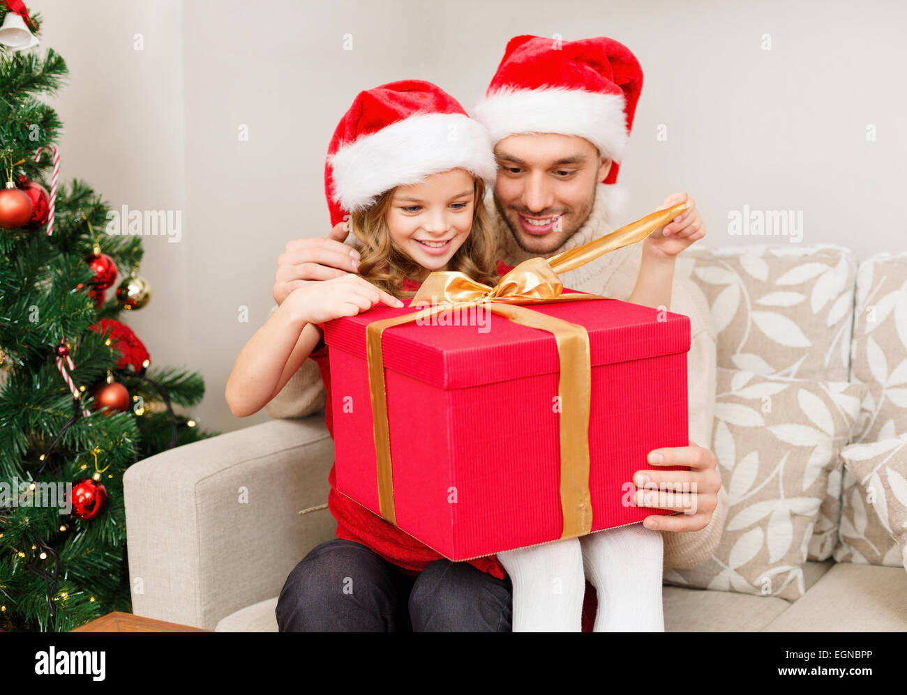 Christmas child opening mas hi-res stock photography and images - Alamy