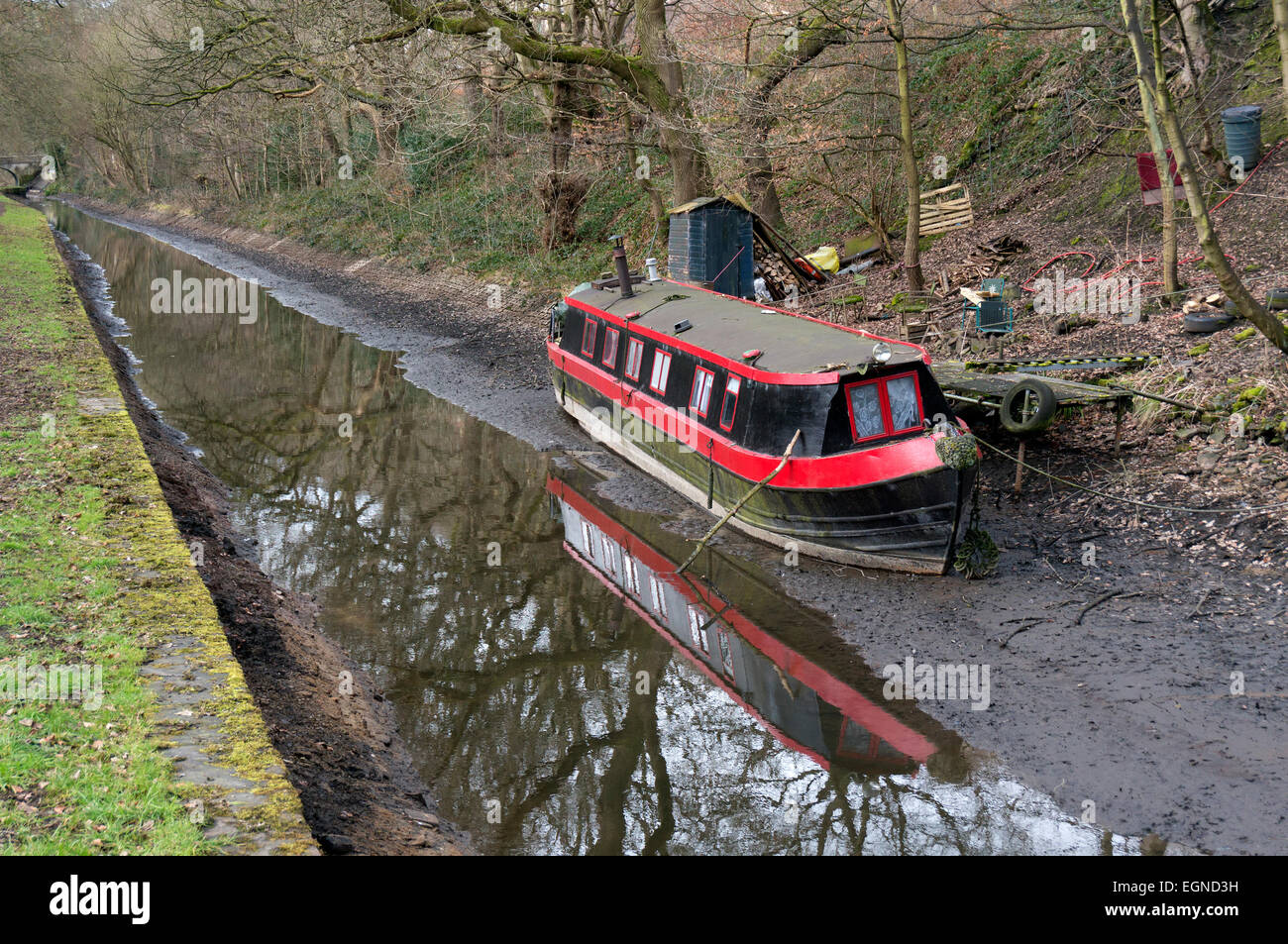 Narrowboat grounded during canal repair work, Sowerby Bridge, West ...