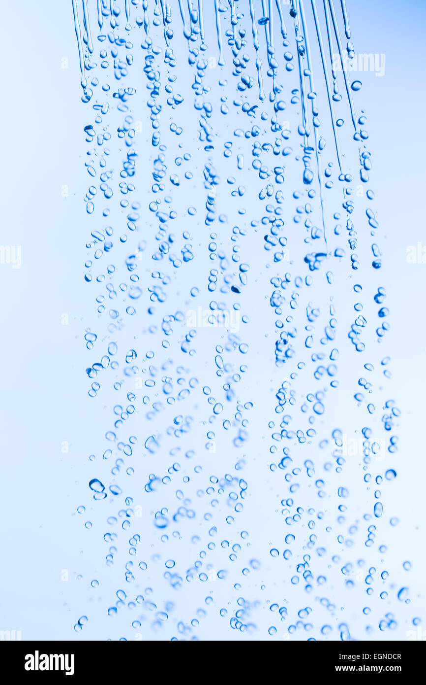 Stream Running Water, Blue background Stock Photo - Alamy