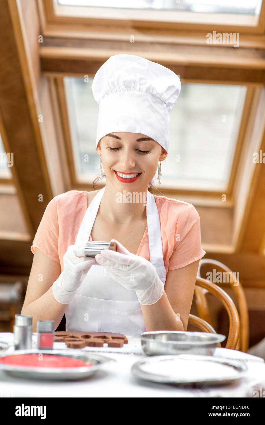 Woman making handmade candy Stock Photo - Alamy