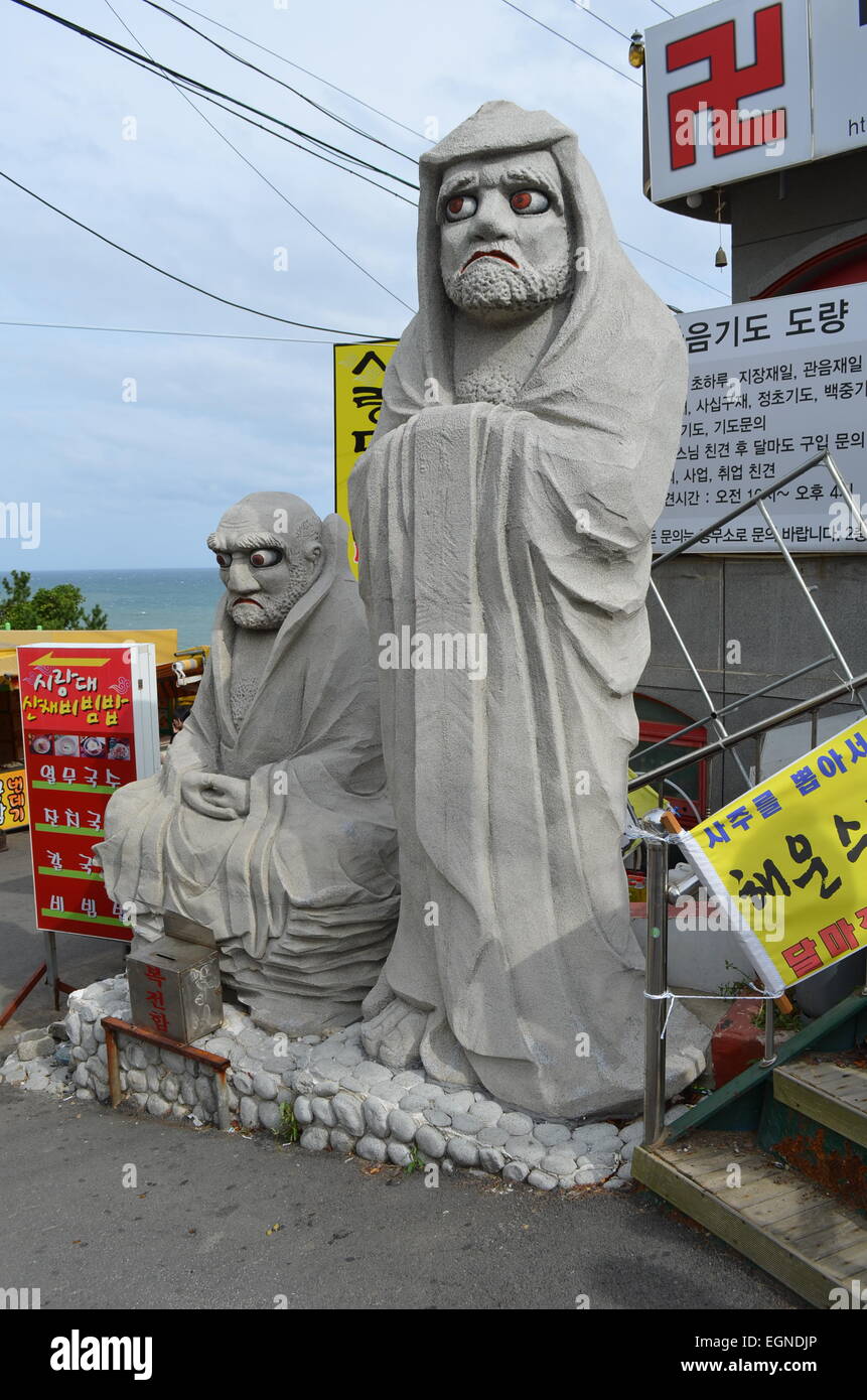 Stone monk statues in Busan, South Korea Stock Photo - Alamy