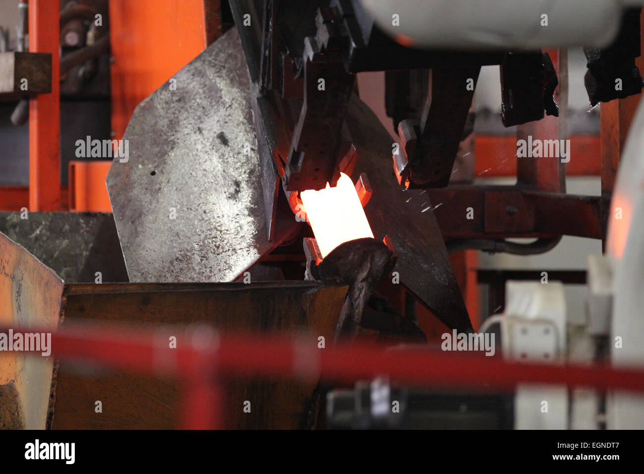 positioning unit and supplying the heated round billet Stock Photo - Alamy