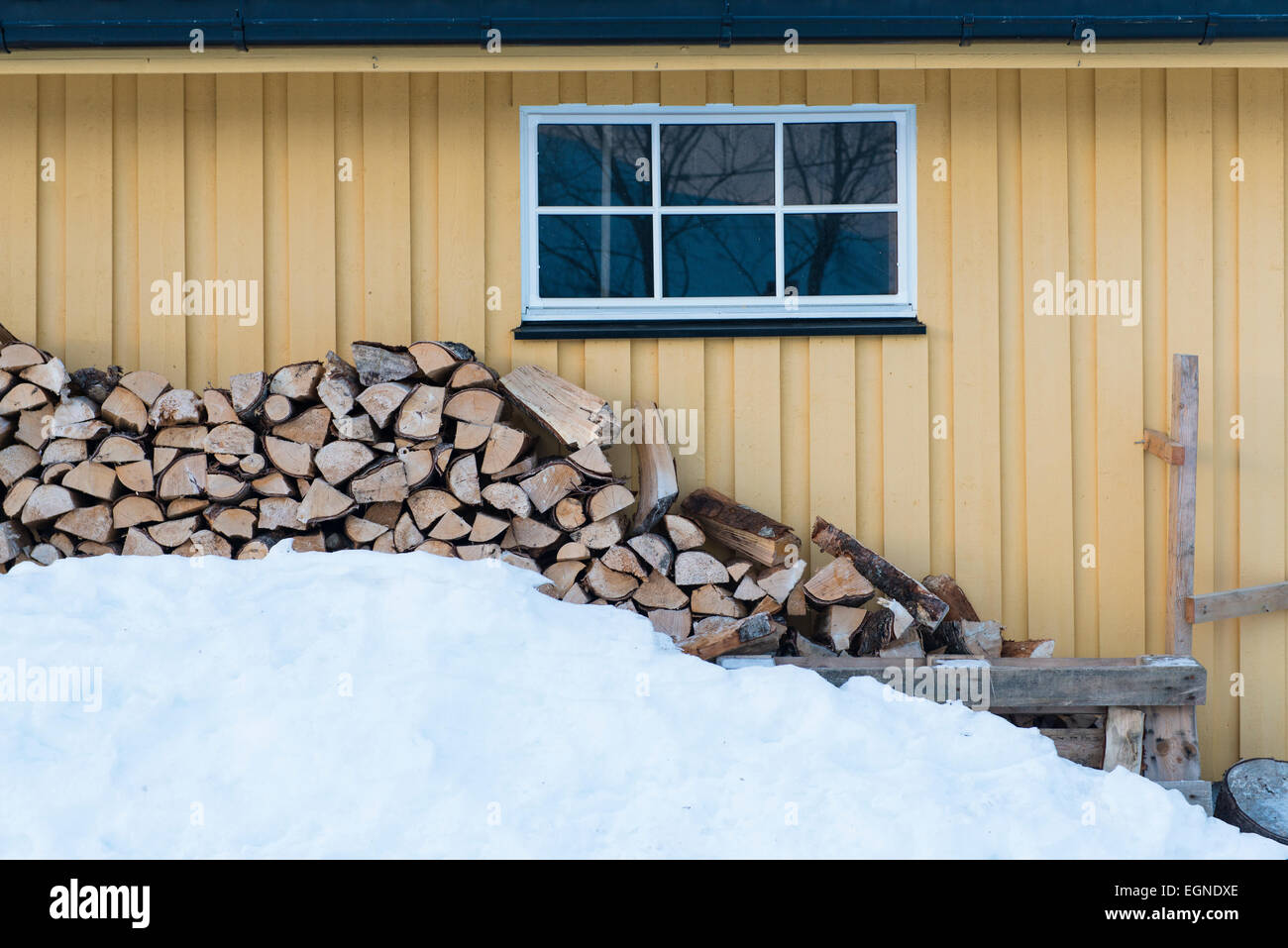 Stack of wood in front of a hut, Lofoten Islands, Norway Stock Photo ...
