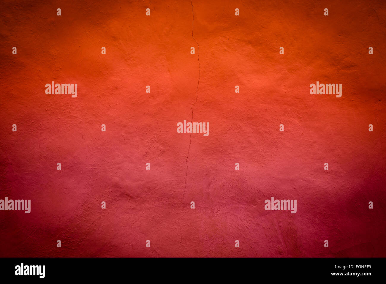 Red background wall texture with dark edges Stock Photo - Alamy