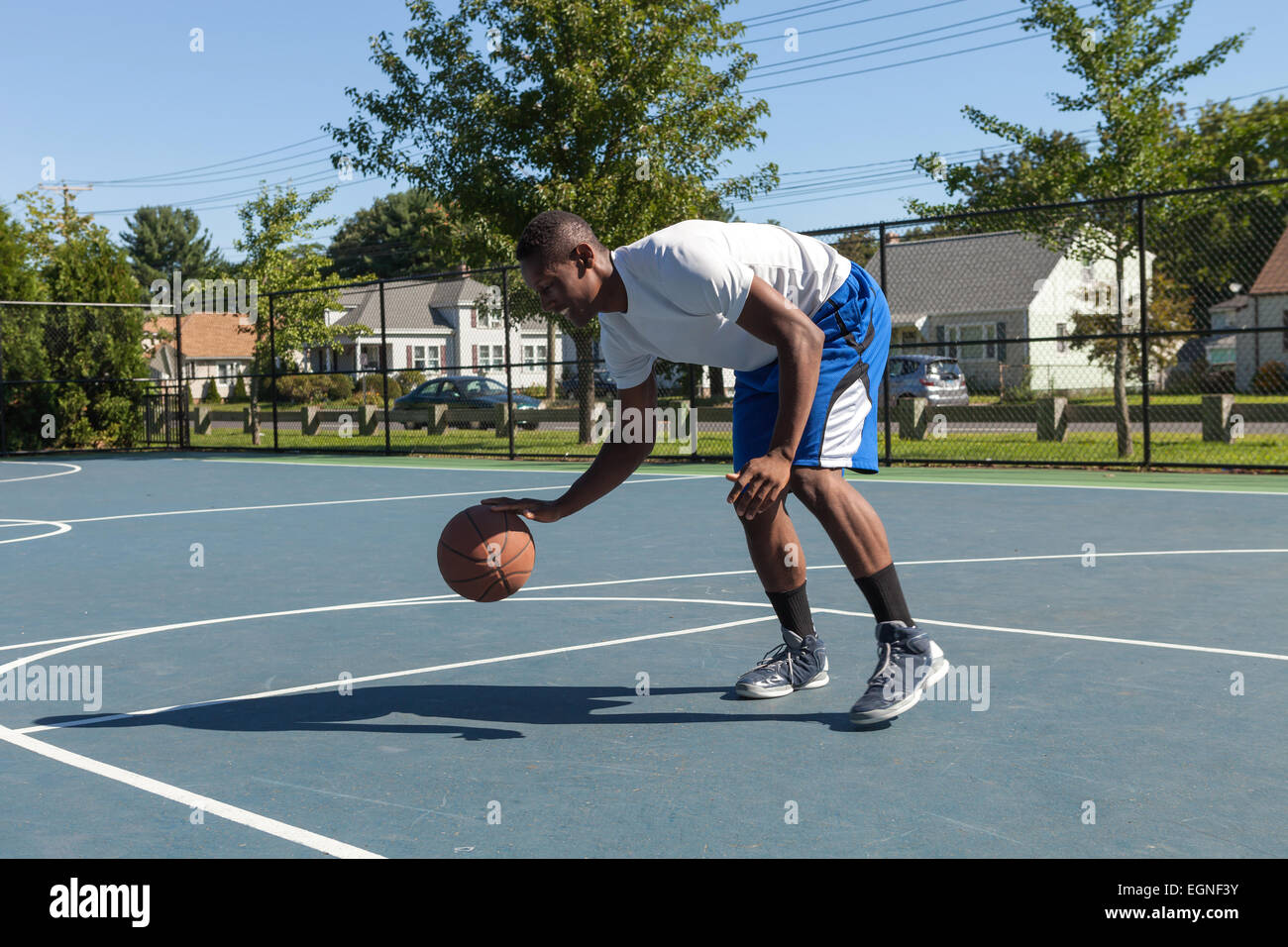 Basketball Player Dribbling Stock Photo - Alamy