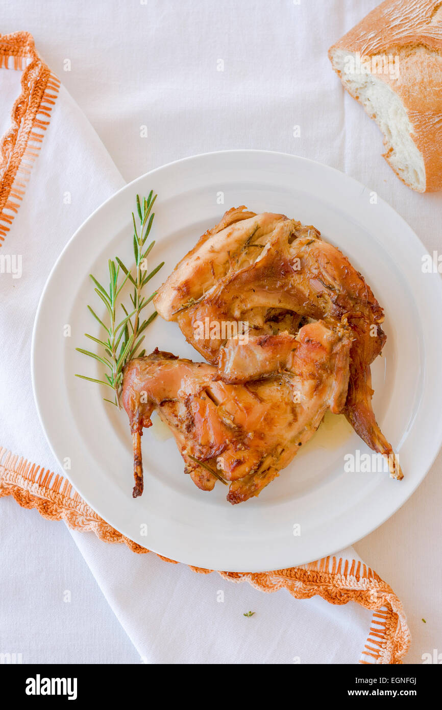 Top view of plate with traditional roasted rabbit. Mediterranean recipe ...