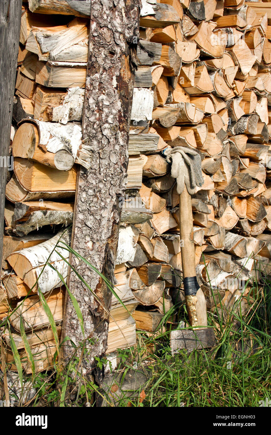 The dry fire wood stored by numbers for storage Stock Photo - Alamy