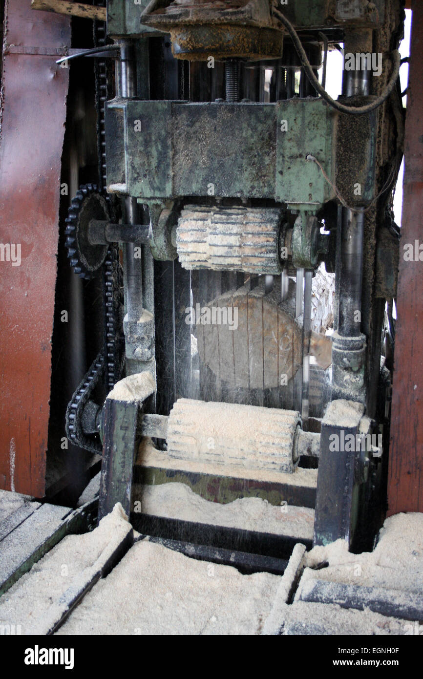 Yellow machine logs hi-res stock photography and images - Alamy