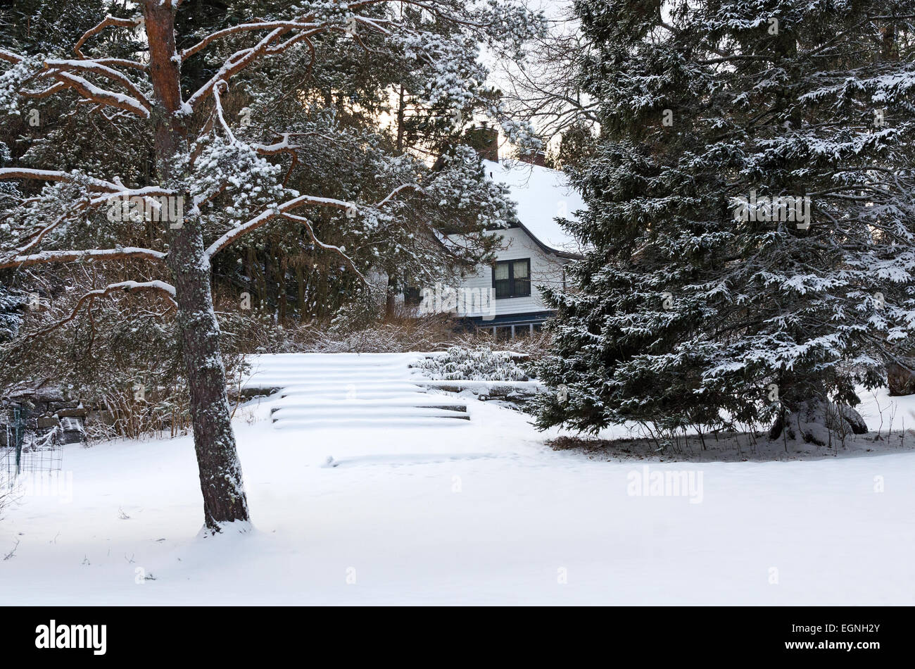 A quaint snow-covered cottage was once part of the Reef Point estate in ...