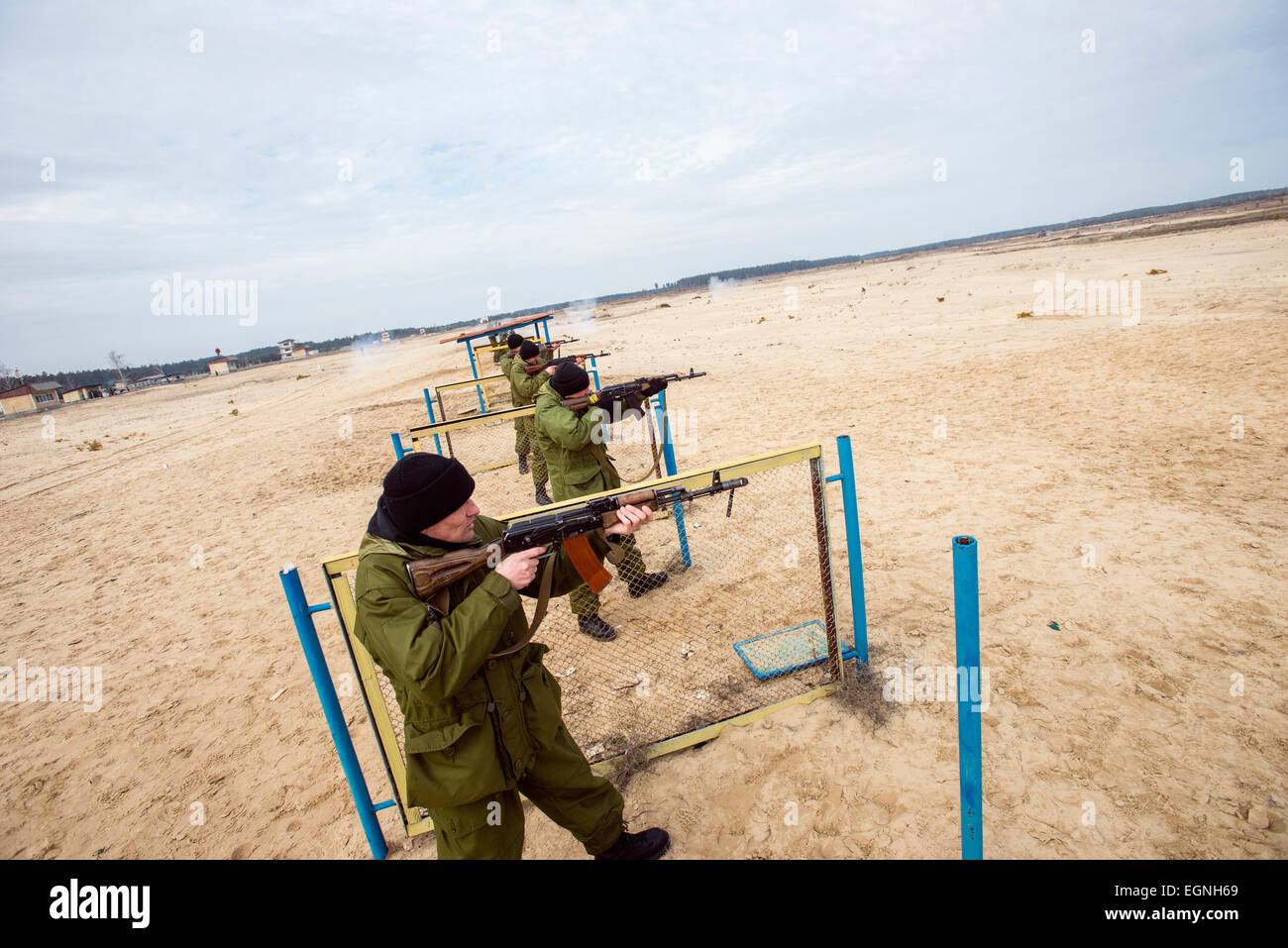 Cadets shooting from Kalashnikov guns during firing training with SPG ...