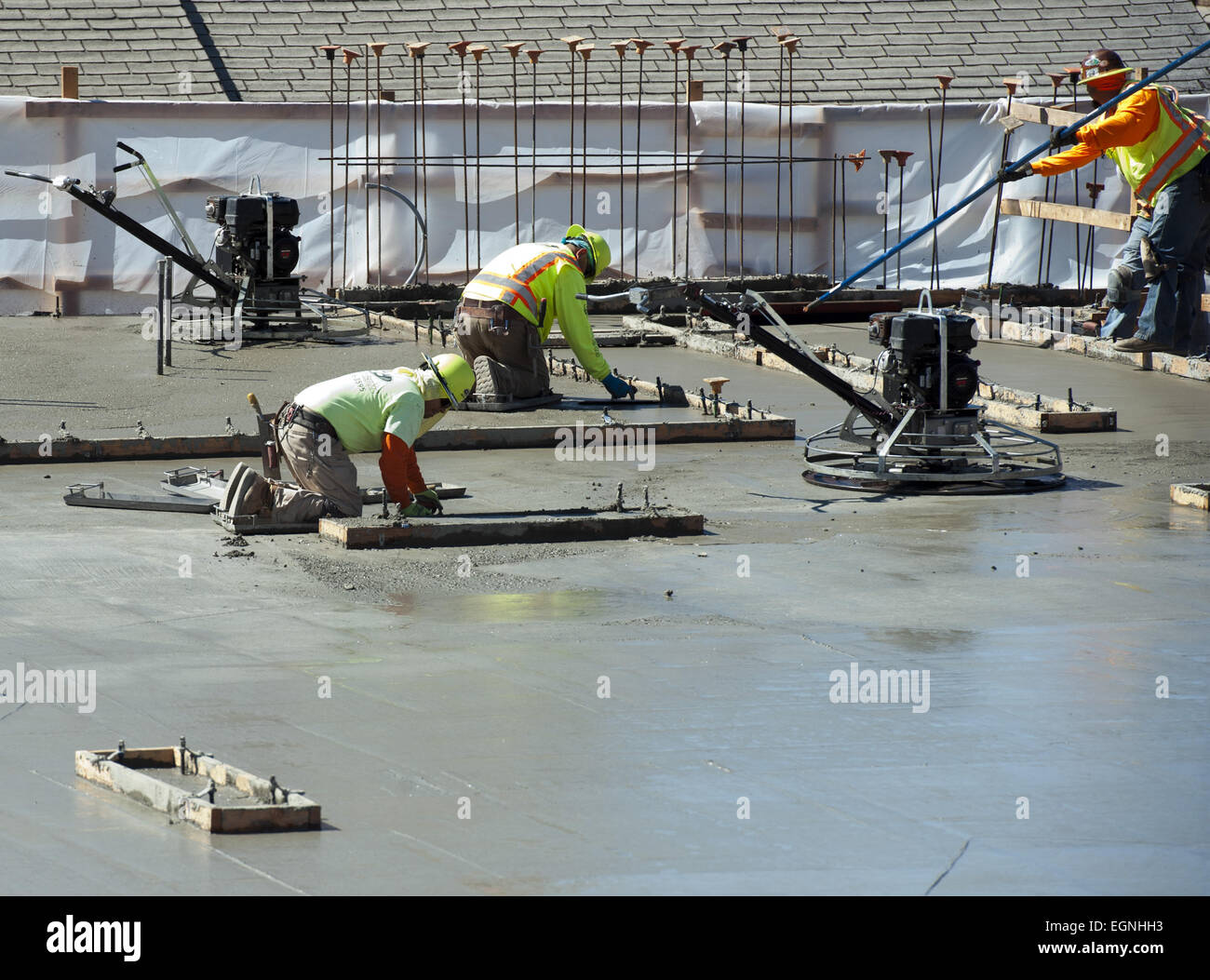 Crew construction workers pour concrete hi-res stock photography and ...