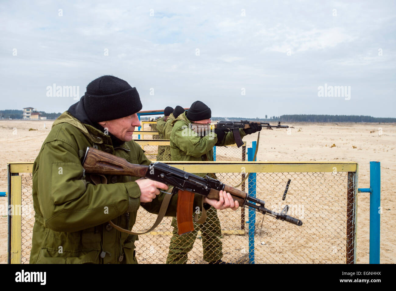 Cadets shooting from Kalashnikov guns during firing training with SPG ...