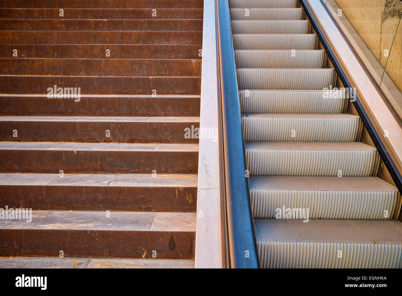 Stairs next to escalator hi-res stock photography and images - Alamy