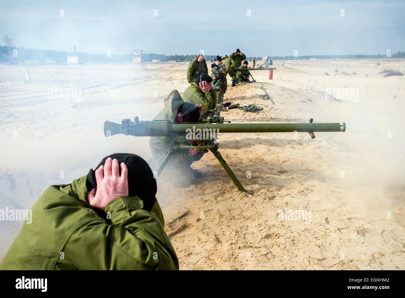 Cadets shoot a SPG recoilless gun during firing training with SPG ...
