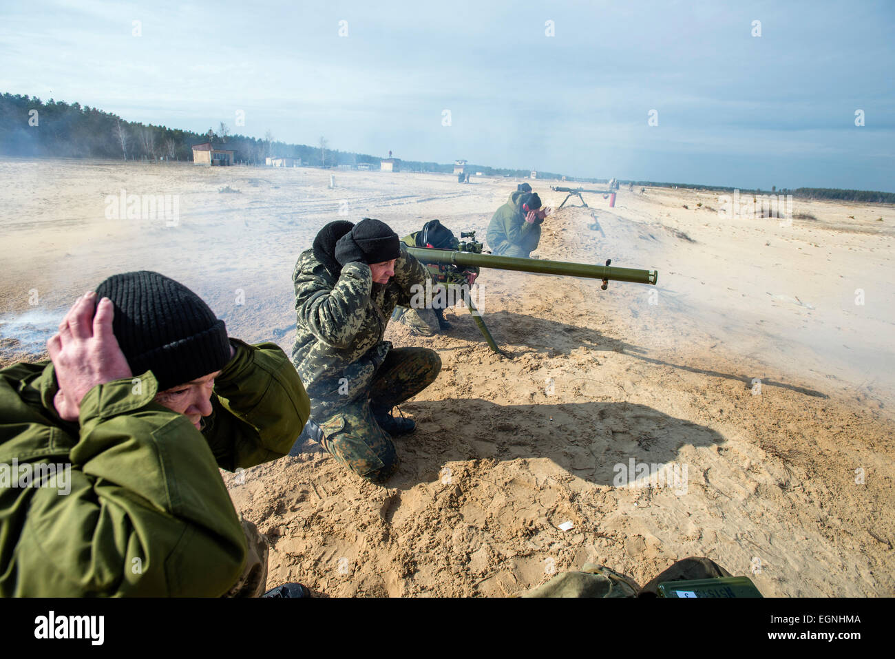 Cadets shoot a SPG recoilless gun during firing training with SPG ...