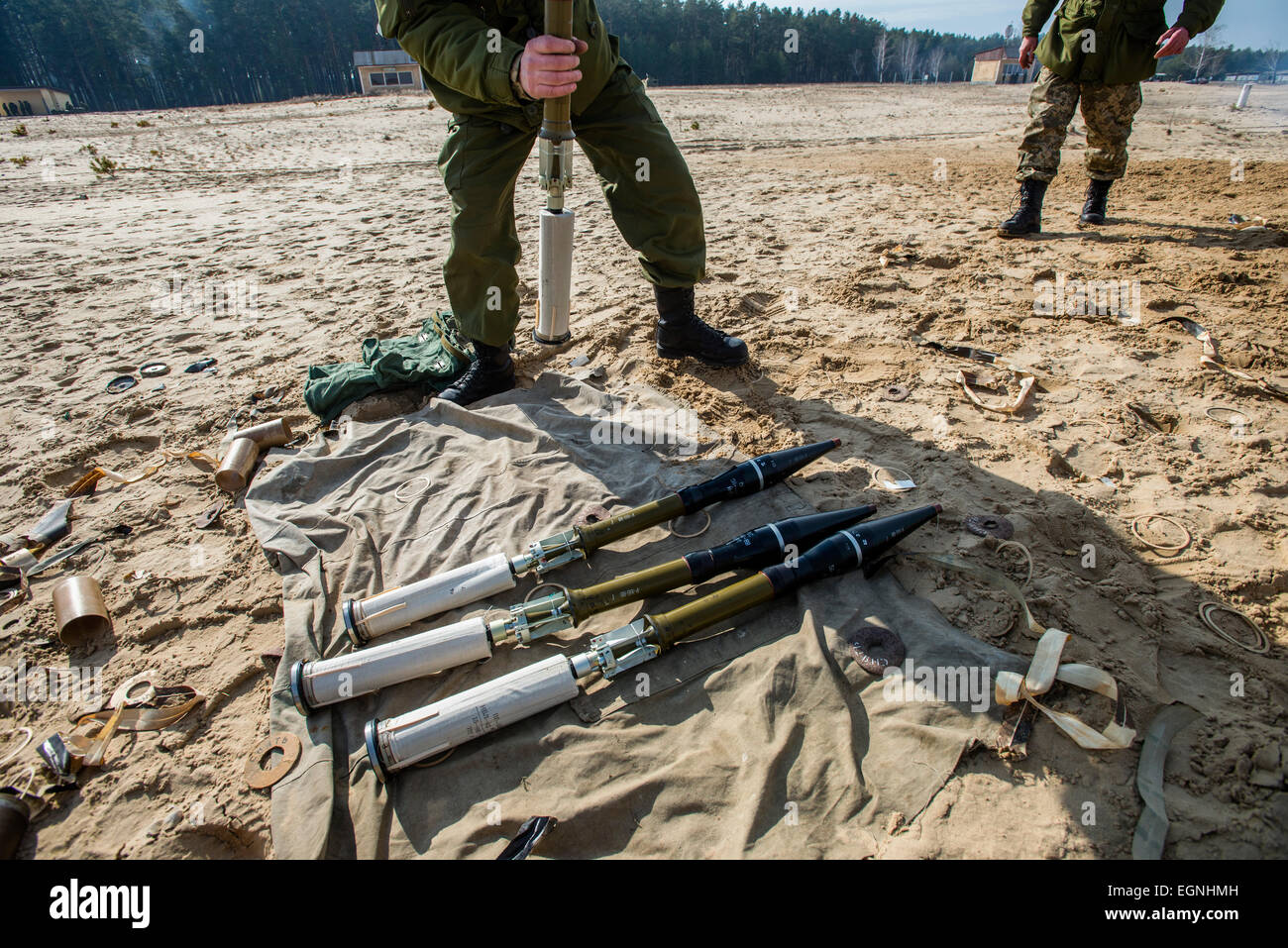 Cadet holds rocket of SPG recoilless gun during firing training with ...