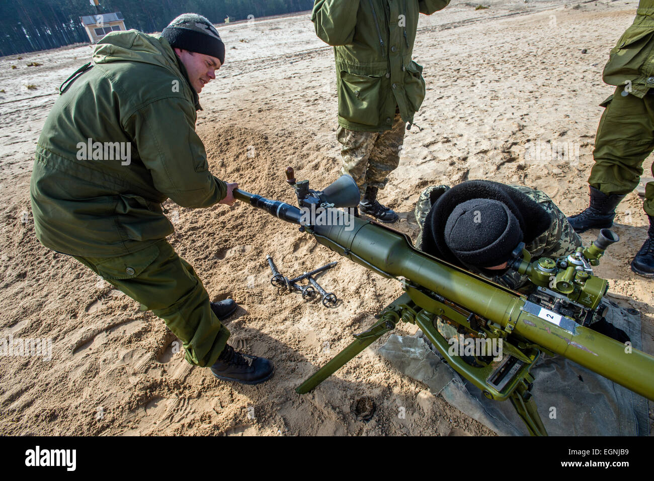 Cadet charges rocket into SPG recoilless gun during firing training ...