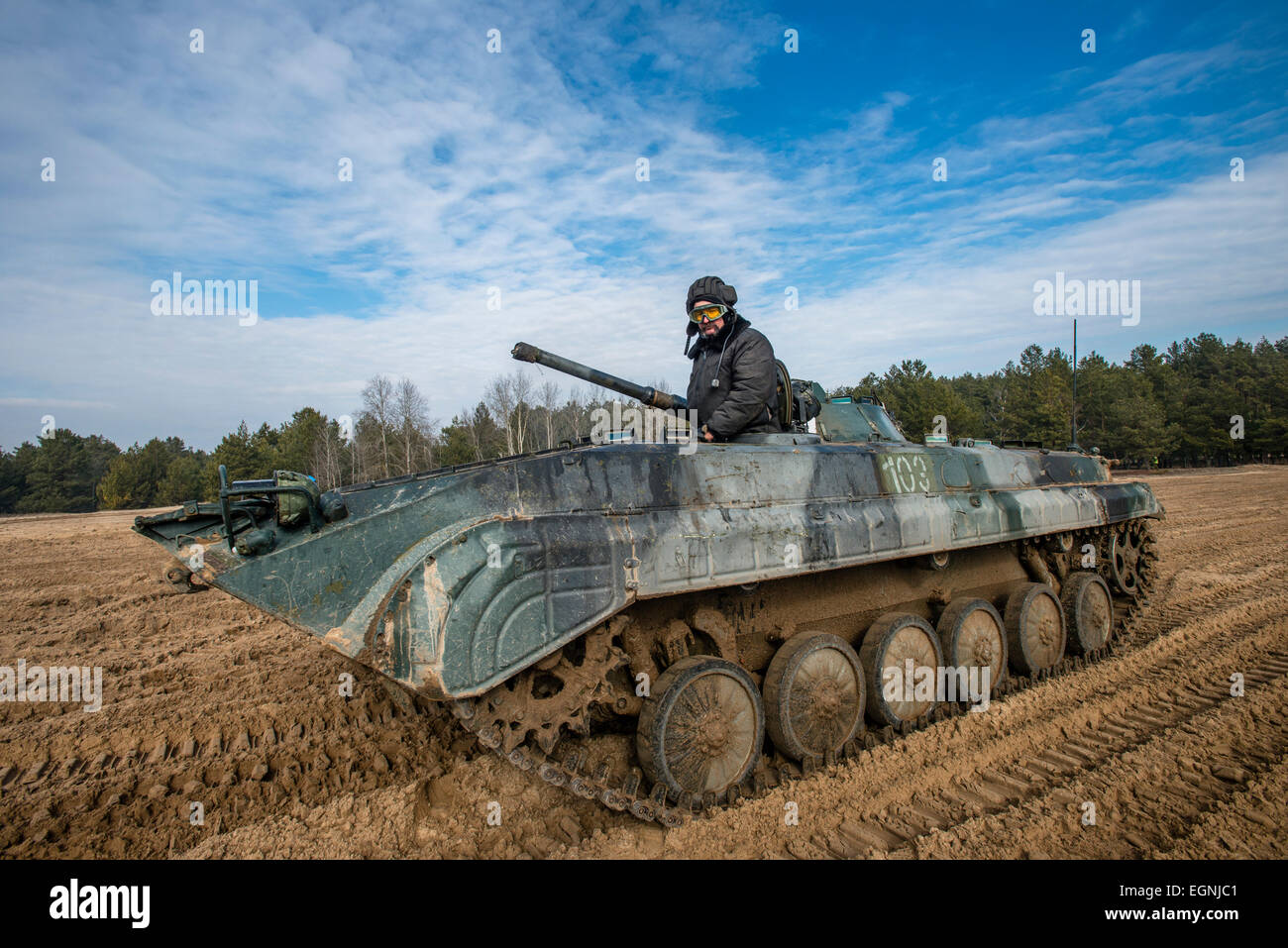 Cadet sits in his BMP-1 infantry fighting vehicle, which he calls ...