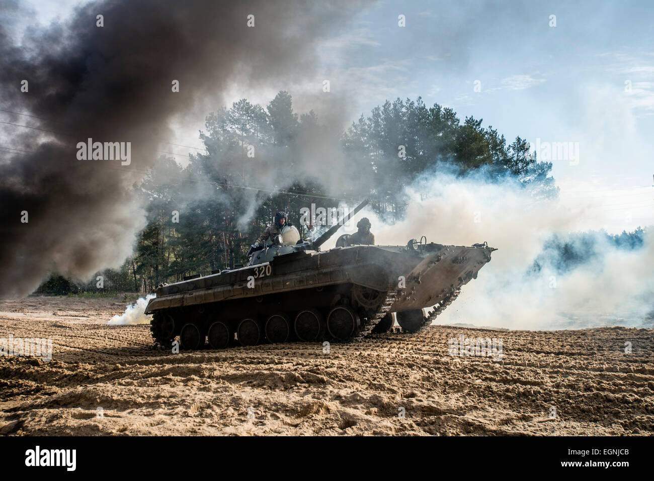 Cadets drive the BMP-1 infantry fighting vehicle during full-scale ...