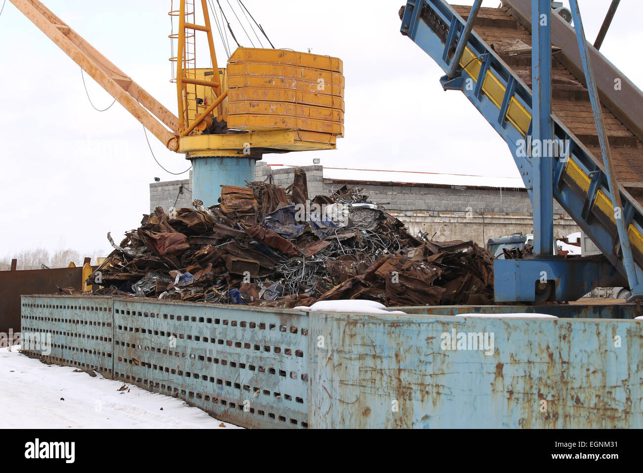Playground for processing scrap metal with an elevator and crane Stock ...