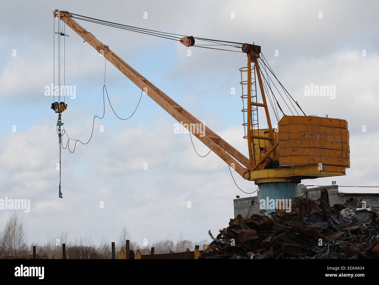 a crane to move the scrap metal and other materials Stock Photo - Alamy