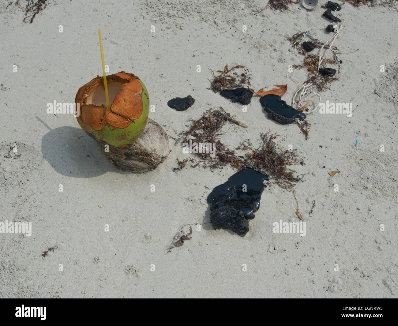 Tar pollution on beach due to oil spillages from shipping in Bintan ...