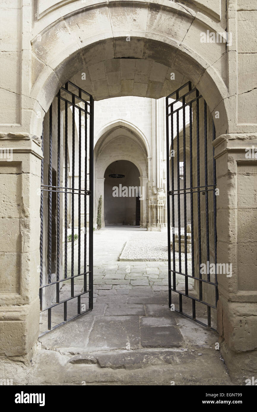 Old metal gate in a medieval church, detail of a door in a church ...