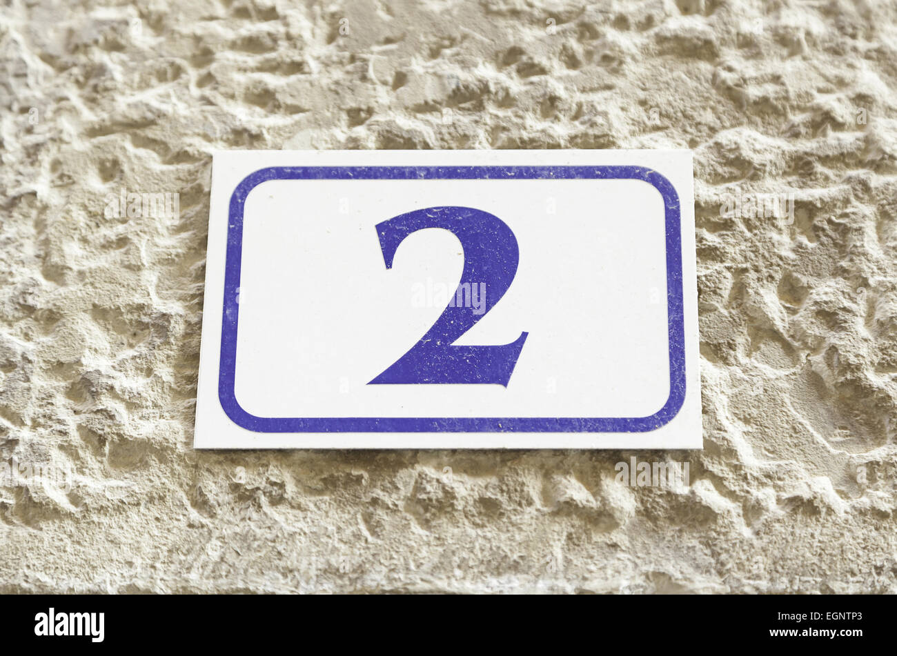 Number two on a wall, detail of a number of information on a wall of a ...