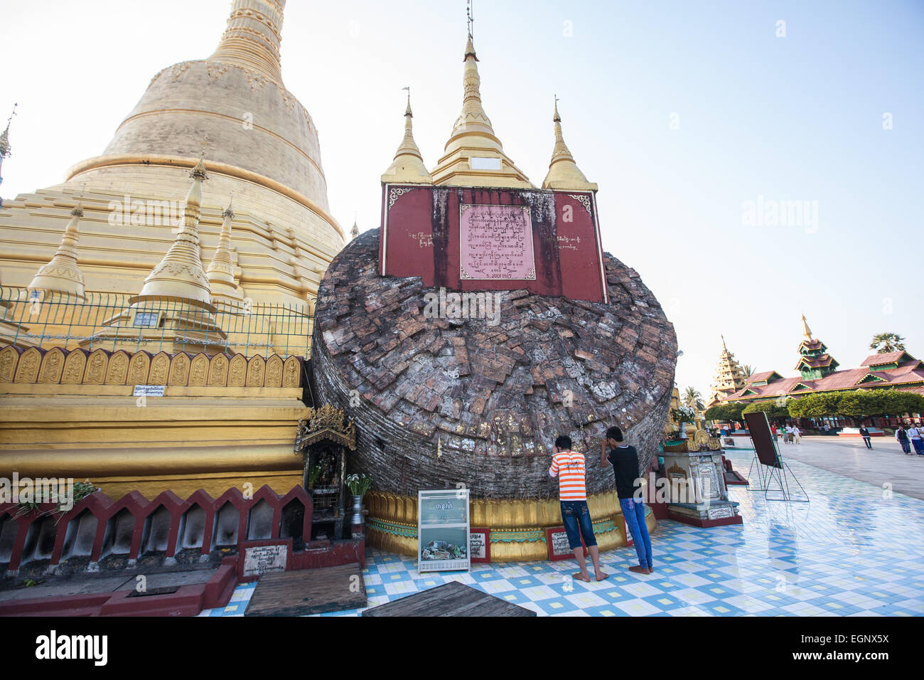 Praying at Golden stupa,pagoda Shwemawdaw at Bago,Pegu, in Burma ...
