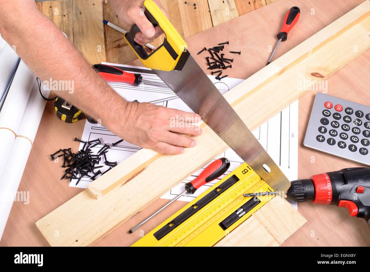 a man made a piece of furniture with various carpentry tools Stock ...