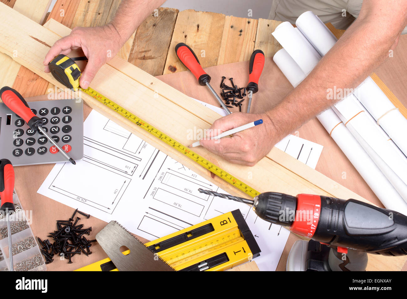 a man made a piece of furniture with various carpentry tools Stock ...