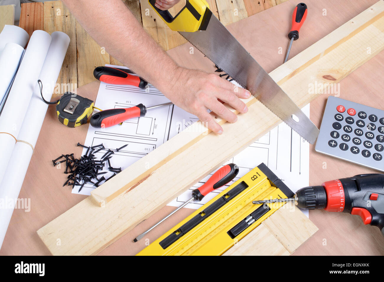 a man made a piece of furniture with various carpentry tools Stock ...