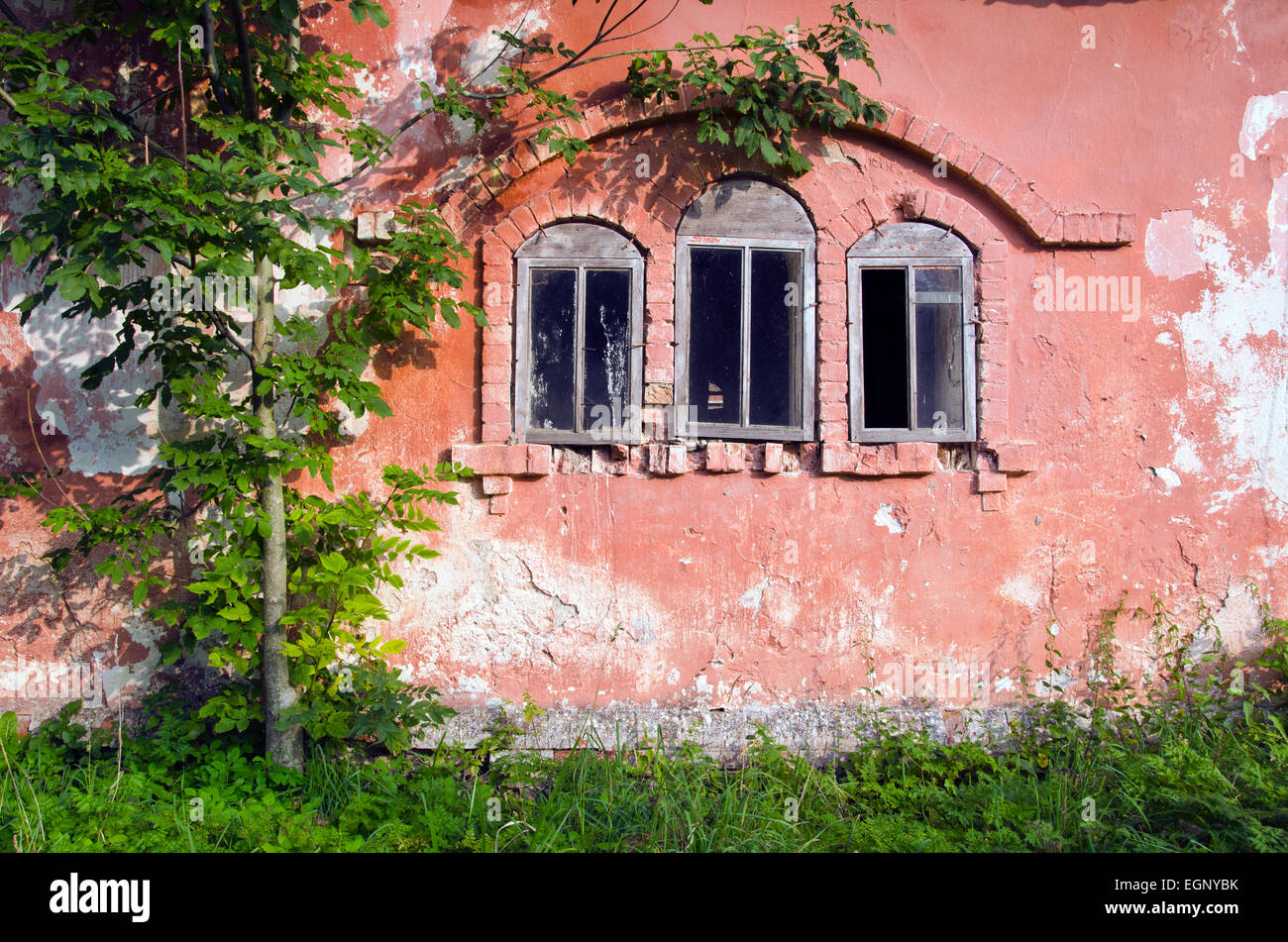 three historical derelict manor ruins windows and cracked wall Stock ...