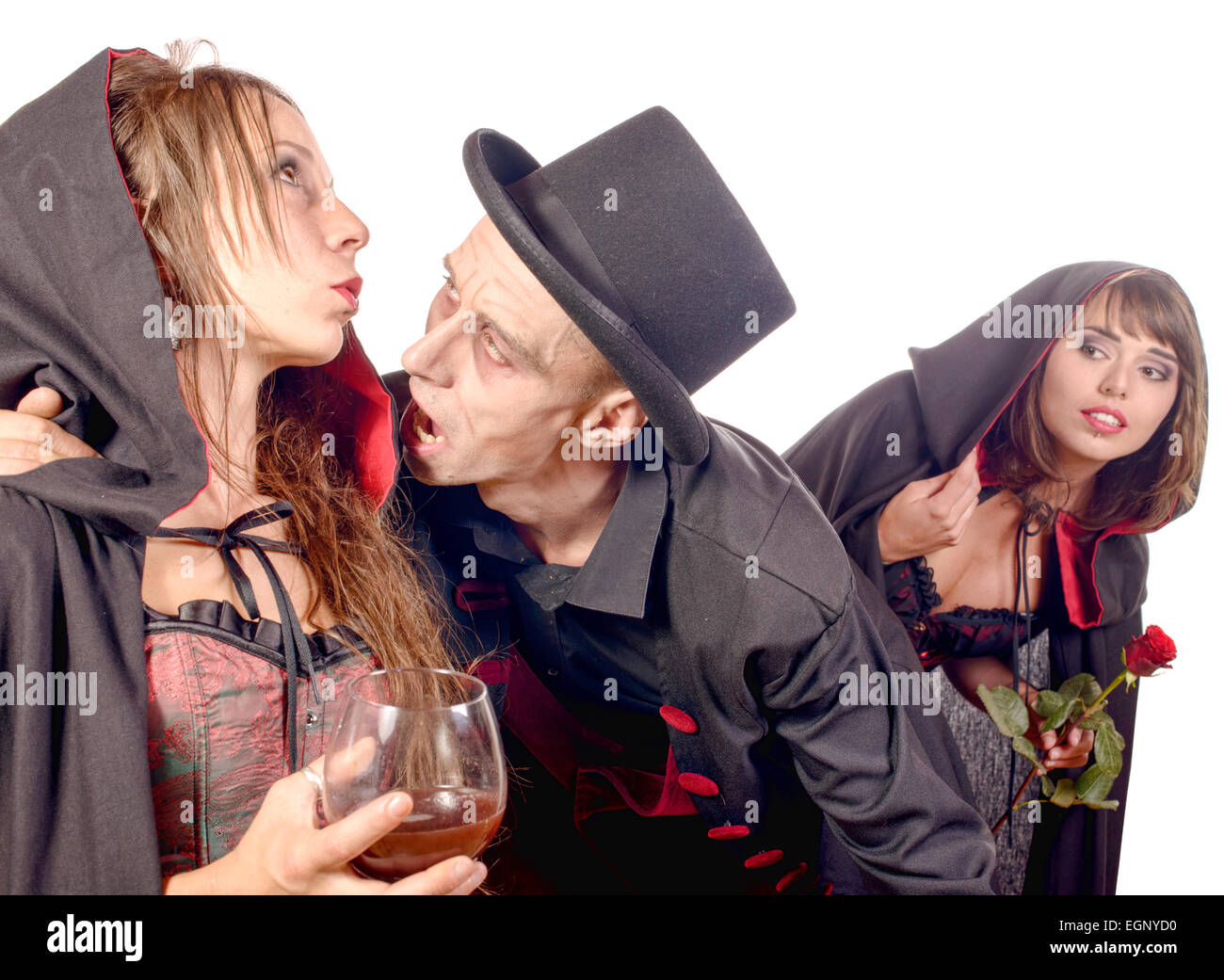 two women and a man in disguise in vampire for halloween Stock Photo ...