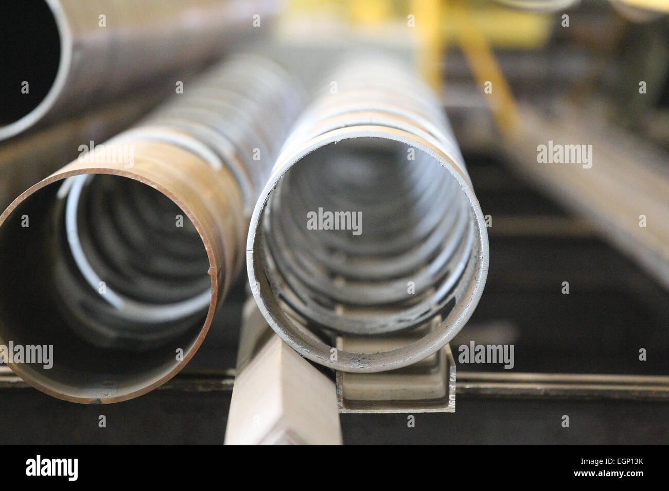 Pipe with oval holes as part of metal structures Stock Photo - Alamy