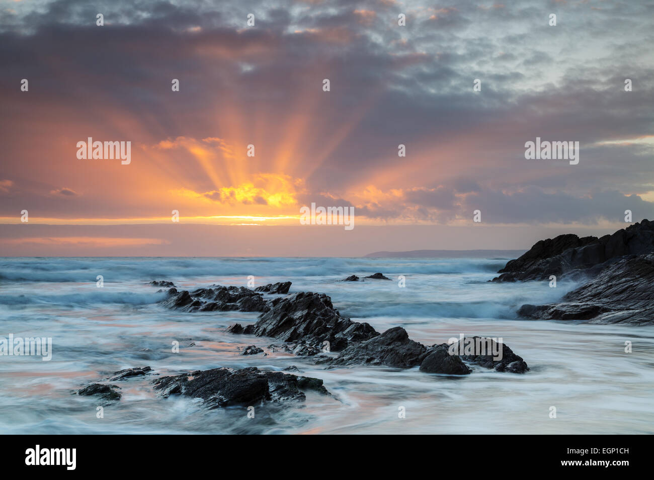 Last rays of the sun at Sharrow Point on the Rame Peninsula Stock Photo ...