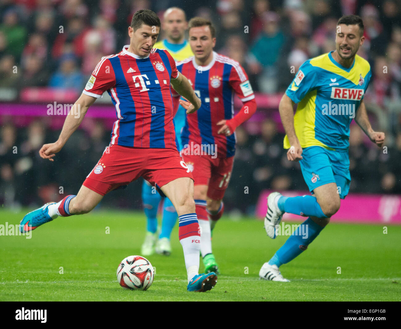 Munich, Germany. 27th Feb, 2015. Munich's Robert Lewandowski (L) and ...