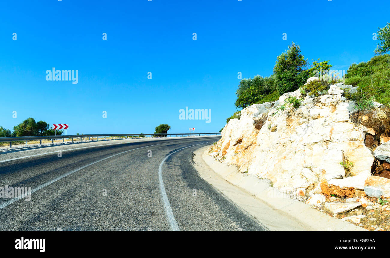 Mountain road on the sea coast in Turkey Stock Photo - Alamy