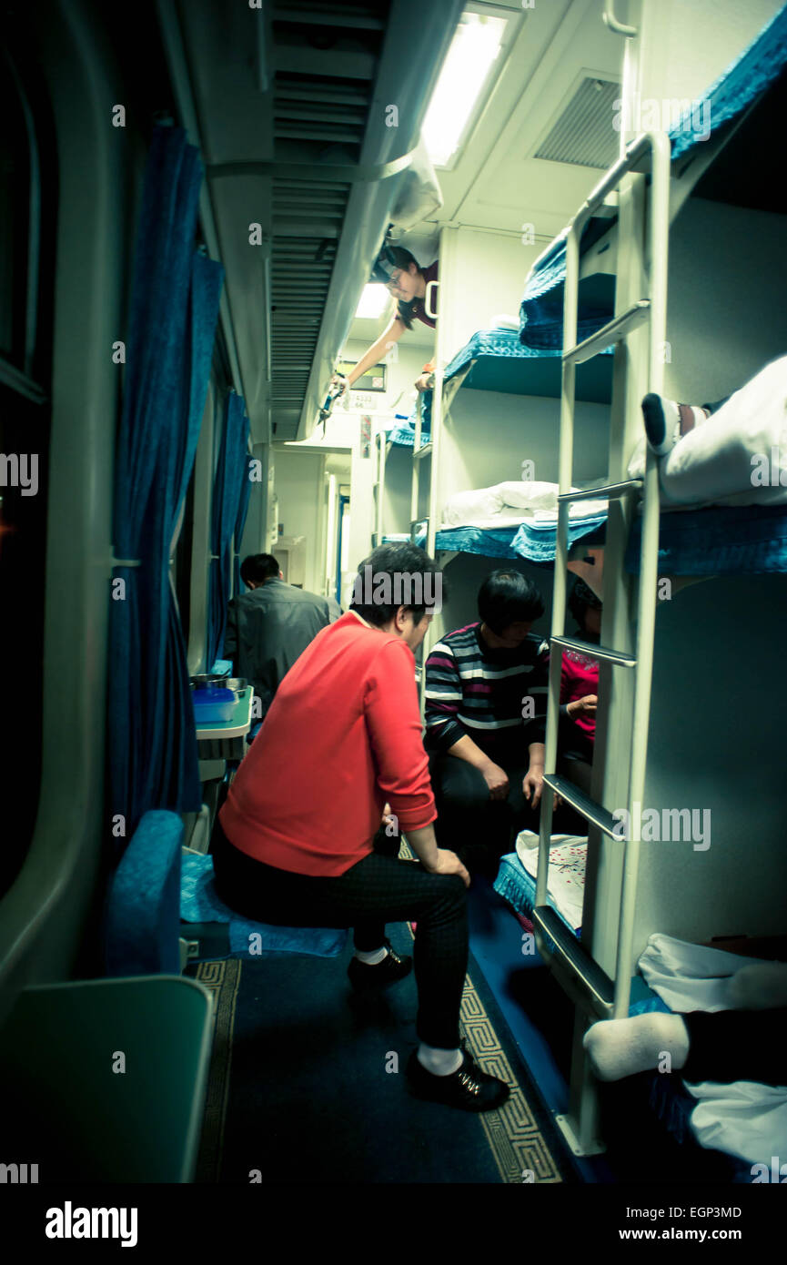 People in a night train in China Stock Photo - Alamy