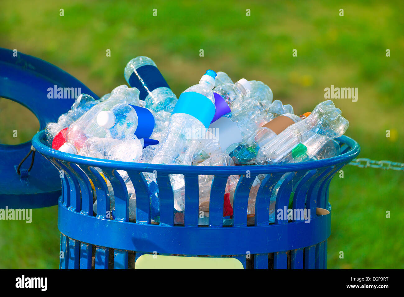 Trash bin full of beverage empty bottles in summer thirsty day Stock ...