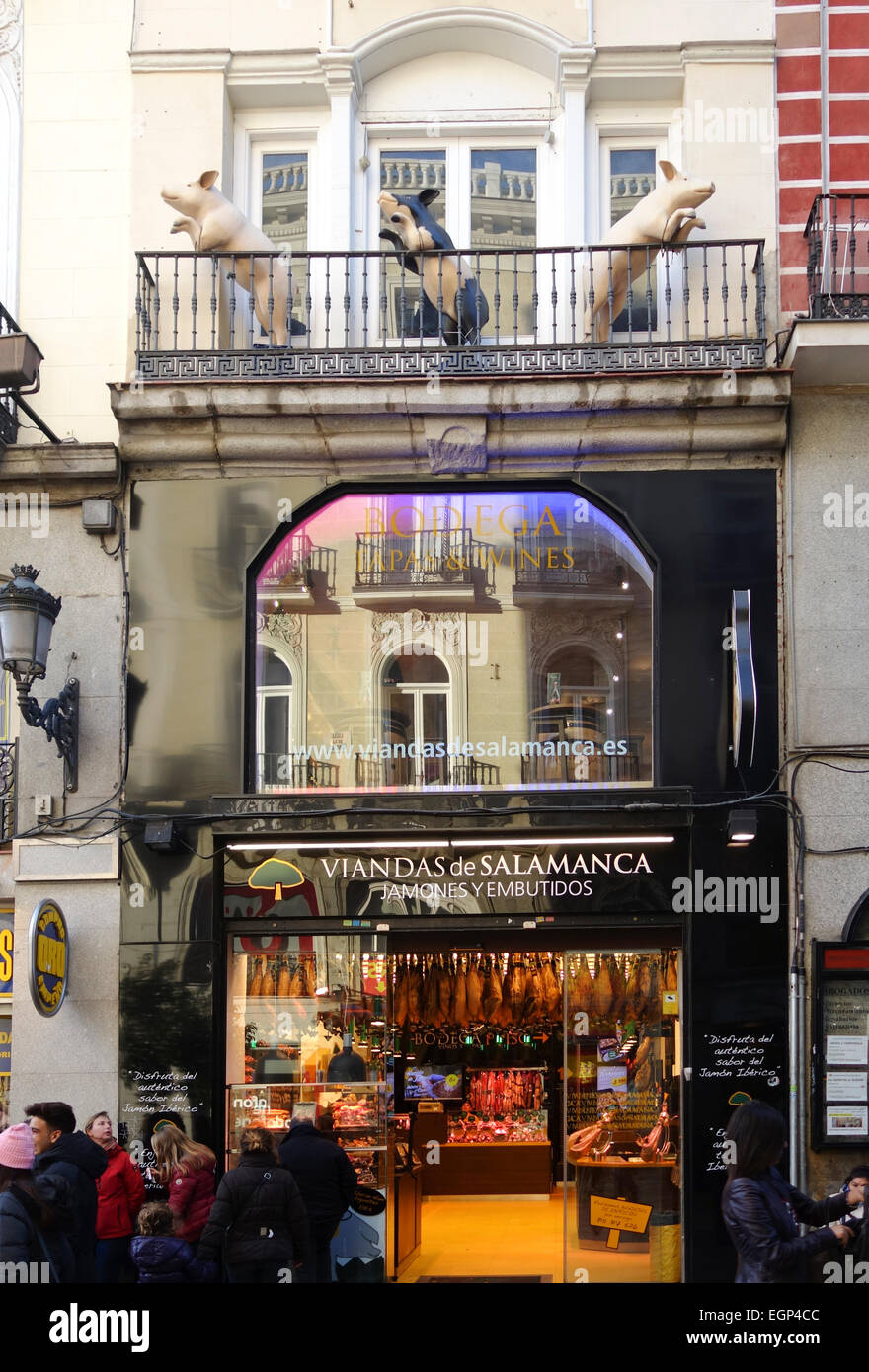 Pig sculptures on balcony, Viandas de Salamanca, Madrid, Spain Stock ...