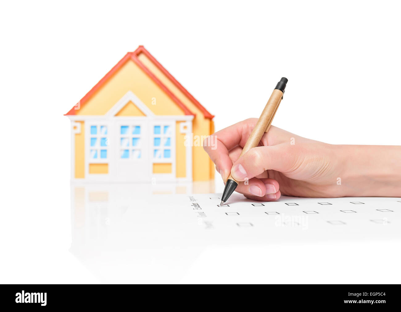Female signing contract on a house Stock Photo - Alamy