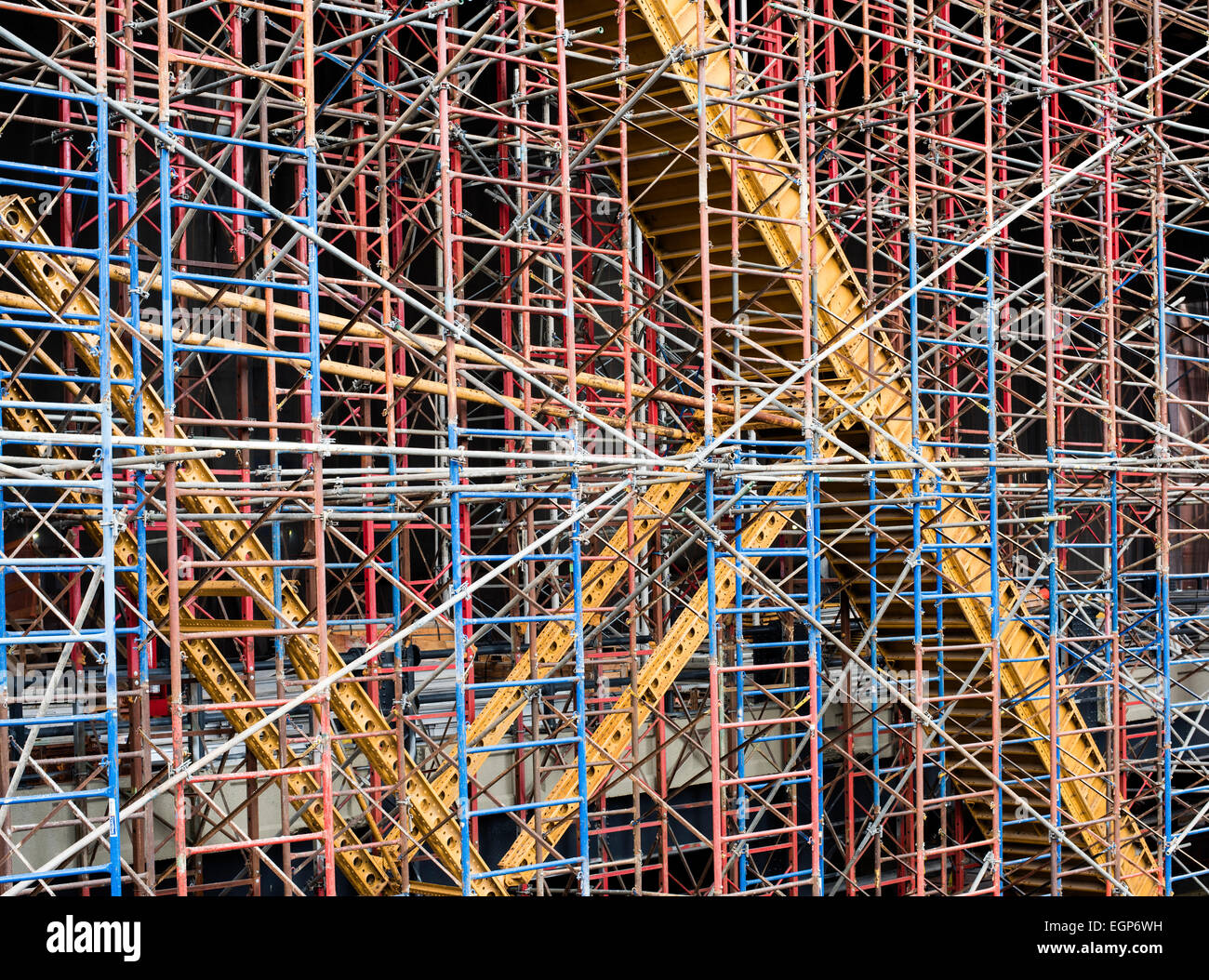 Colorful scaffolding and reinforcement at a construction site Stock ...