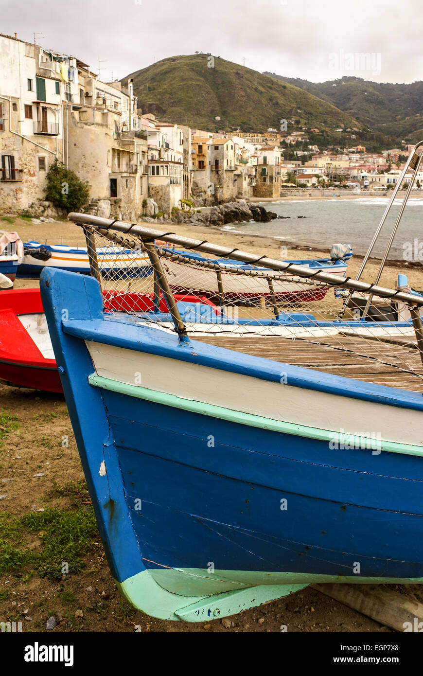 Sicilian fishing boat on the beach in Cefalu, Sicily Stock Photo - Alamy