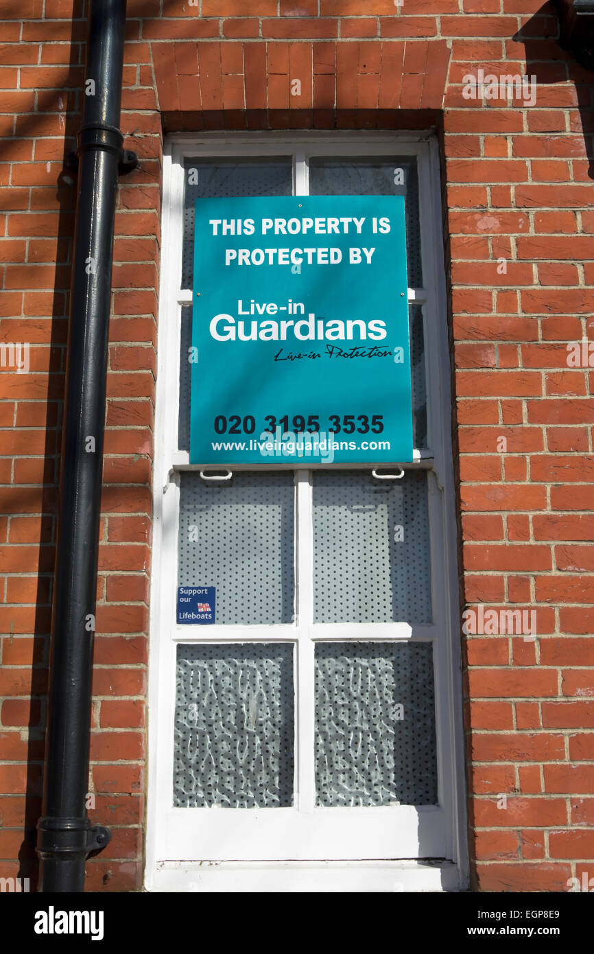 this property protected by live-in guardians sign, hampton, middlesex ...