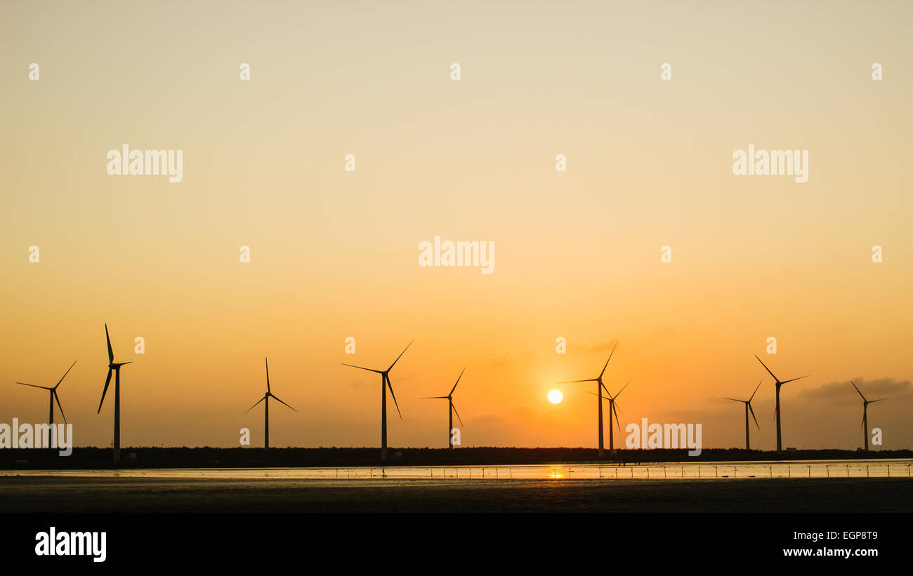 Wind turbines sunset Stock Photo - Alamy