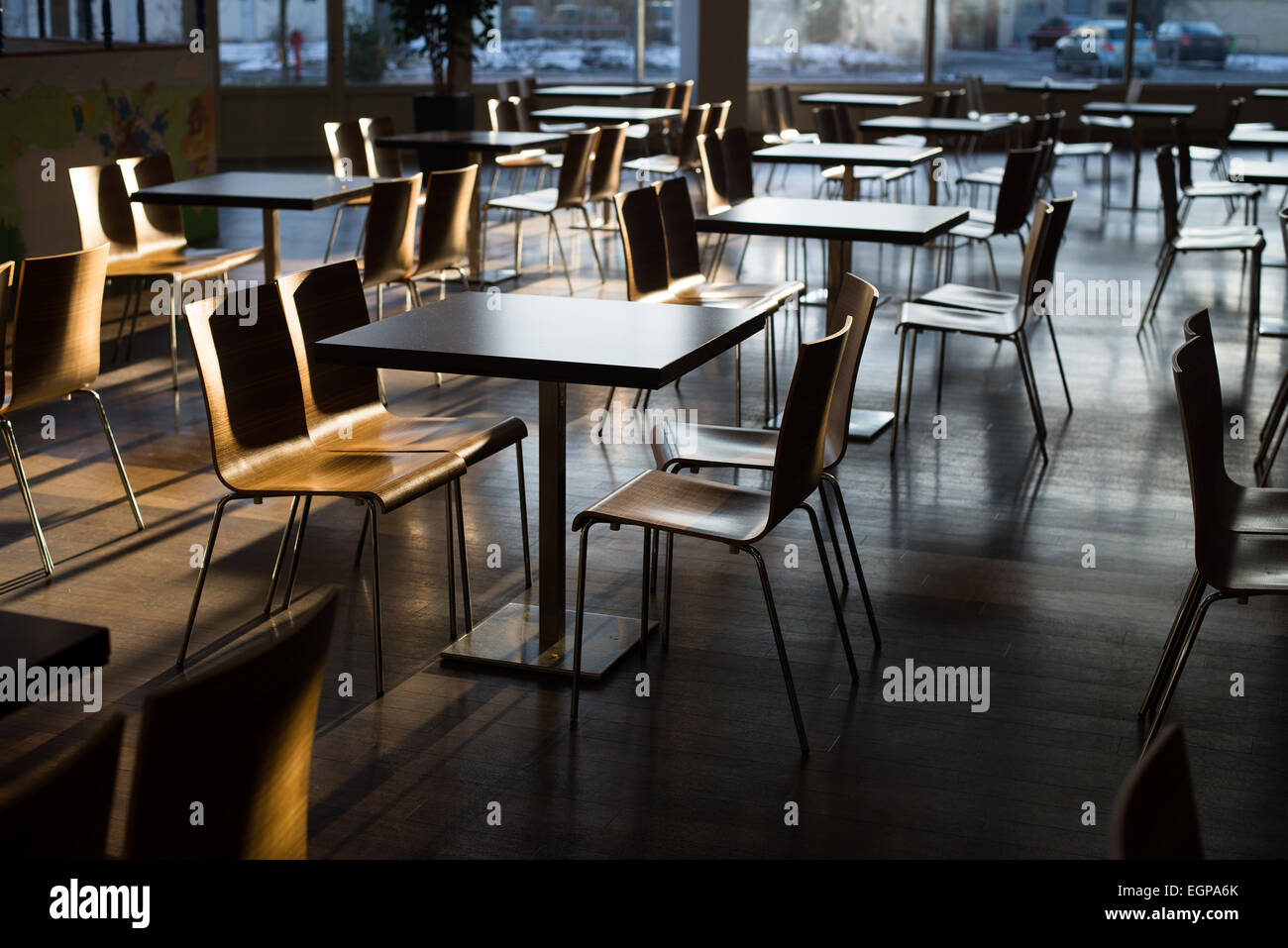 Empty fast-food restaurant lit by morning sun Stock Photo - Alamy