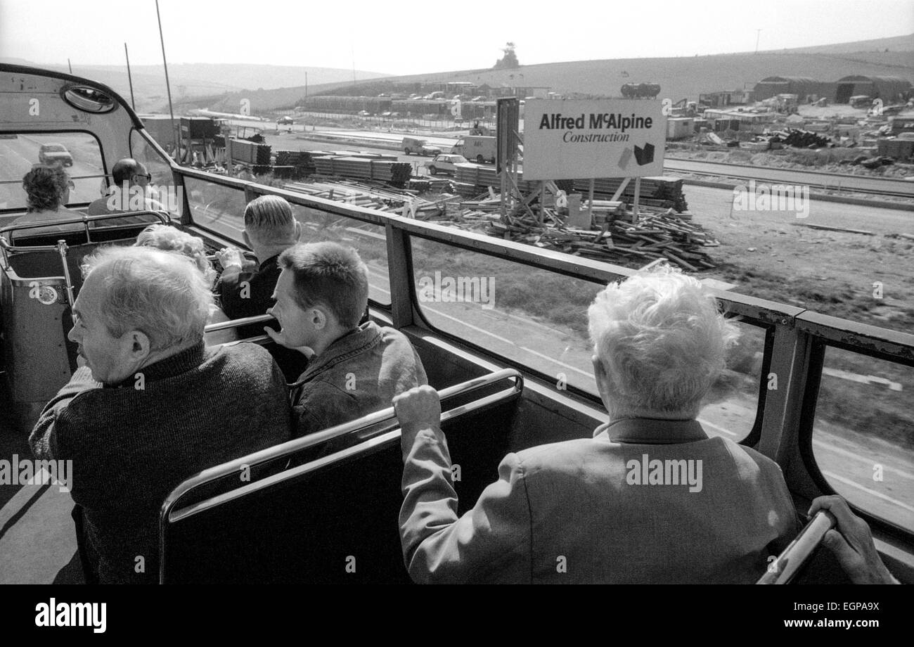 Sightseers on a coach tour of Brighton's new A27 by-pass, still under ...